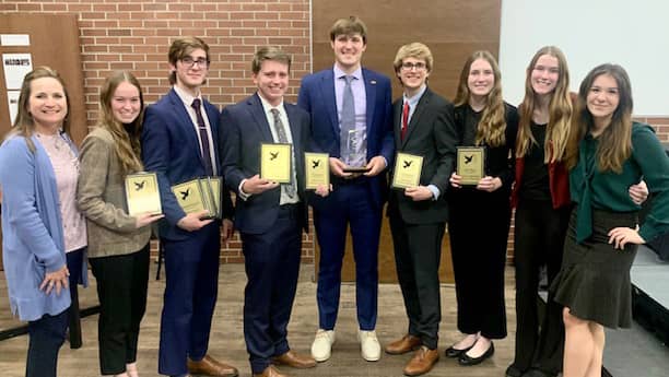 HPU speech and debate students earn awards, champion titles at national ...