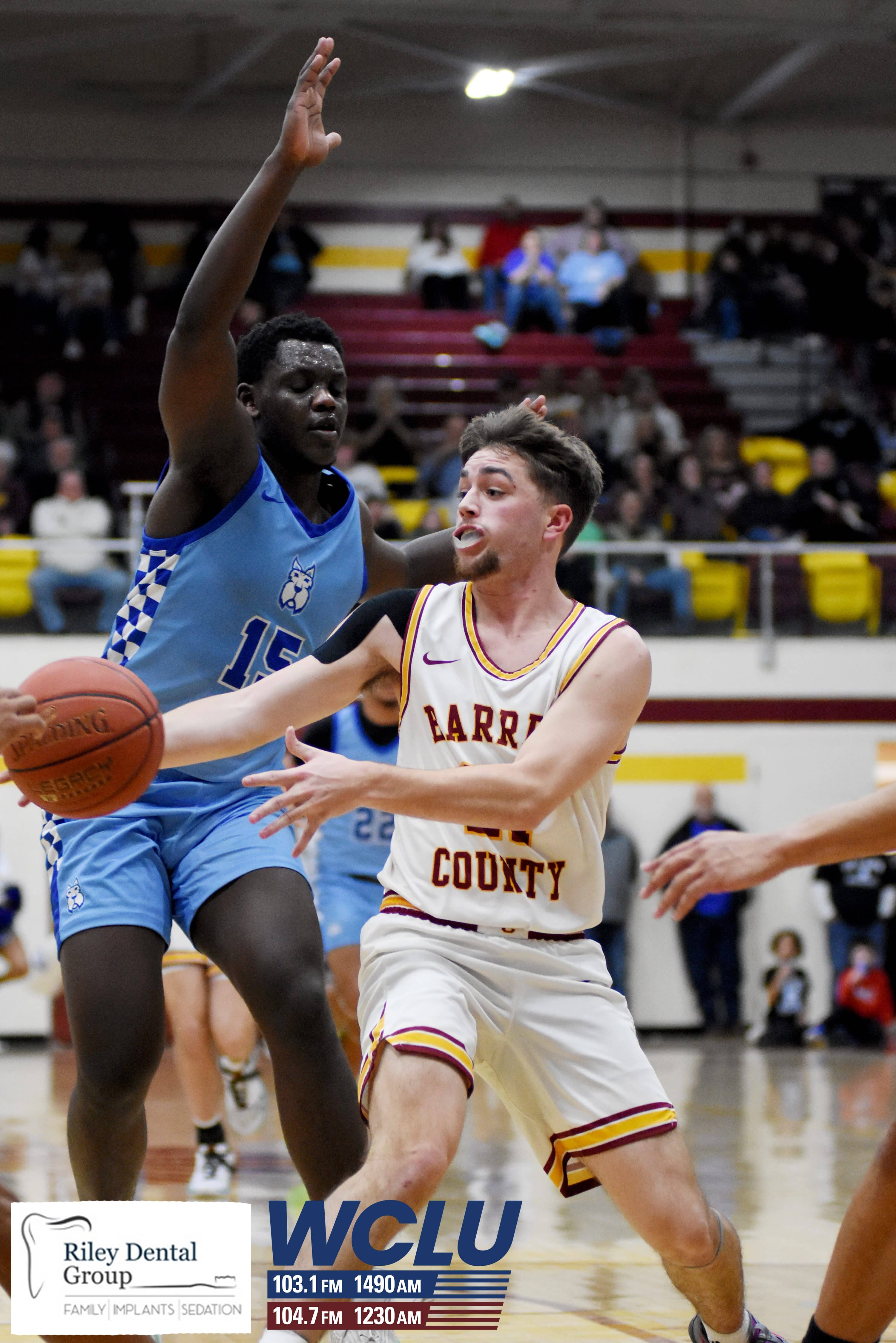 GALLERY: Trojans clip Scotties, 40-38 | WCLU Radio