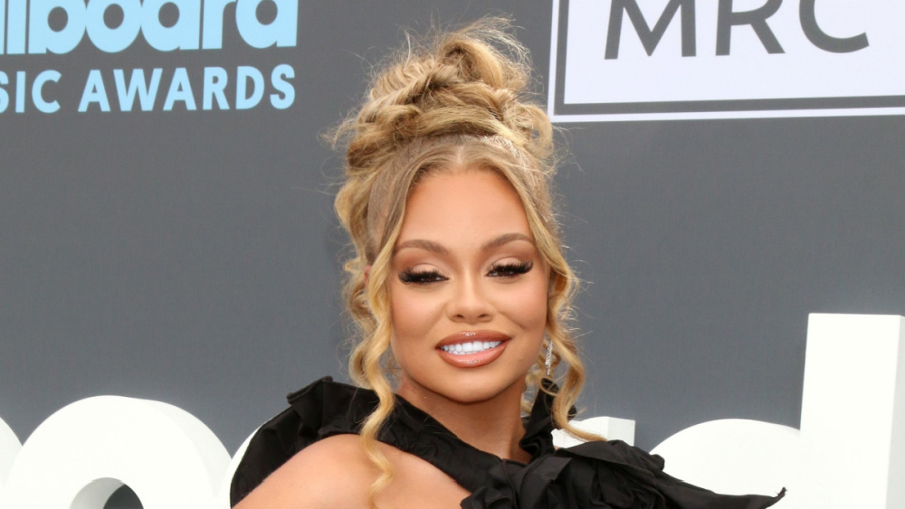 See Latto and Cardi B in the video for the remix of "Put It on da Floor ...