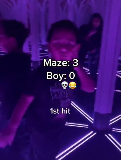 Boy Doesn't Stand A Chance Against This Mirror Maze | 95.1 KSKY