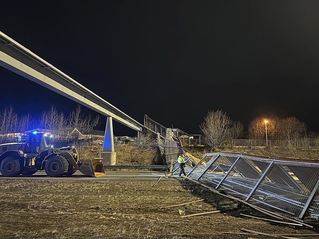 Fencing, roof of Anchorage pedestrian bridge fall in strong wind ...