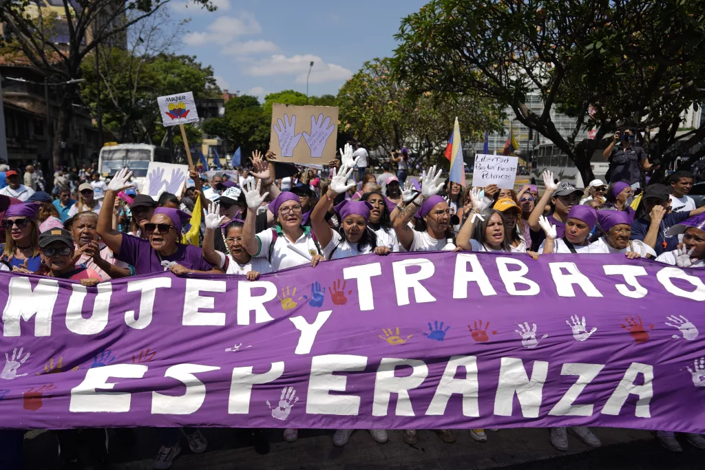 Facing Historic Shifts Latin American Women Bathe Streets In Purple On