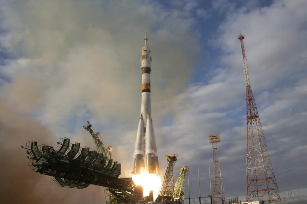 Russian Soyuz spacecraft with 3 astronauts docks at the International ...