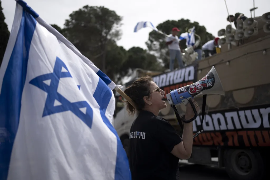 With its soldiers mired in Gaza, Israel fights a battle at home over ...