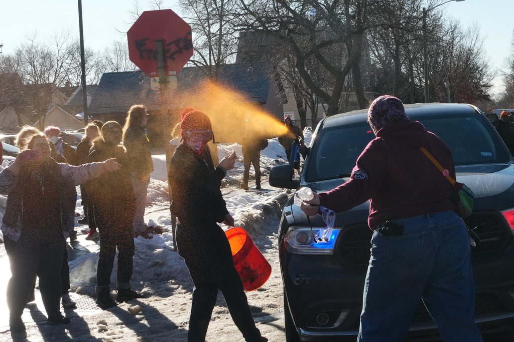 Minnesota protesters, agents repeatedly square off while prosecutors ...