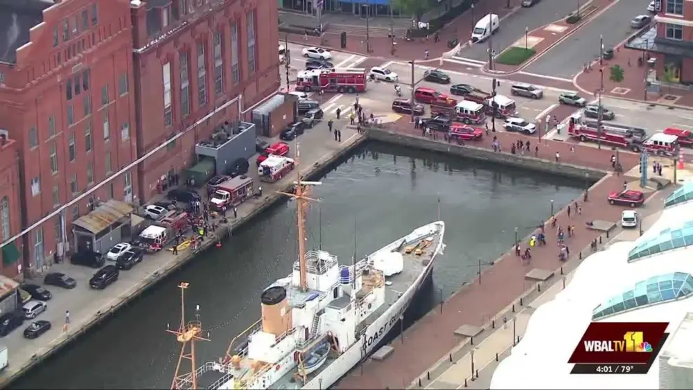 Divers pull man from water behind Power Plant Live | WBAL Baltimore News