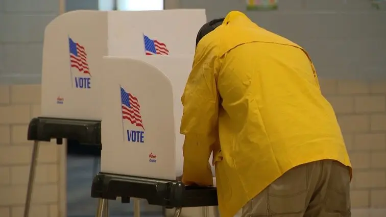 'I wouldn't miss an election': Maryland voters push through rain to ...